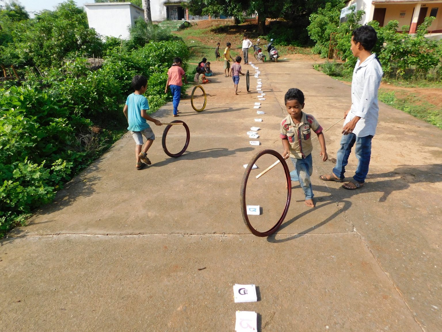 Learning language through hoop rolling : Play is the highest form of ...